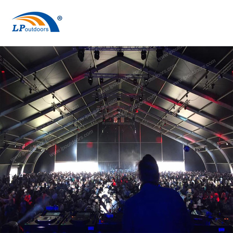 Curved style temporary stadium tent for concert or sports court